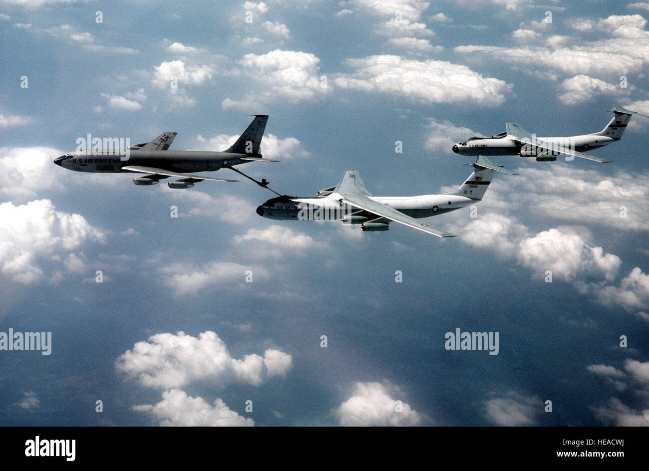 An air-to-air left side view of a KC-135A Stratotanker aircraft from ...