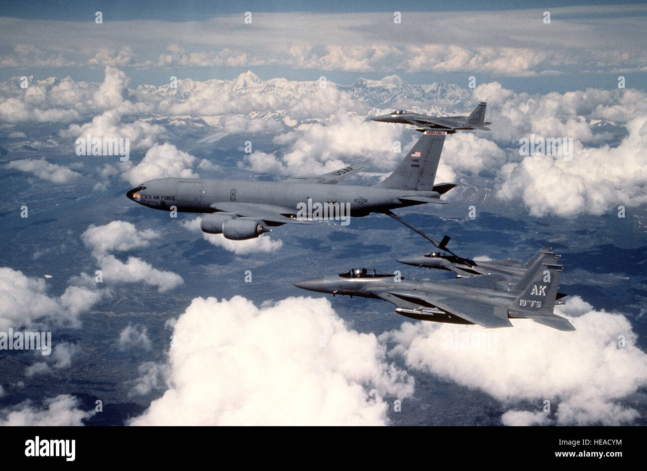 A Nebraska Air National Guard KC-135 refuels F-15 Eagles from the 19th ...