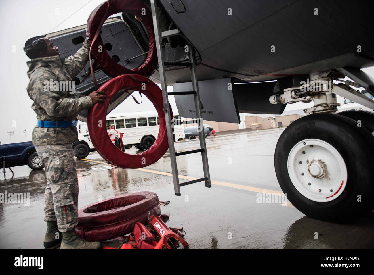 Airman Alvin Carr, 92nd Maintenance Squadron crew chief, hands engine ...
