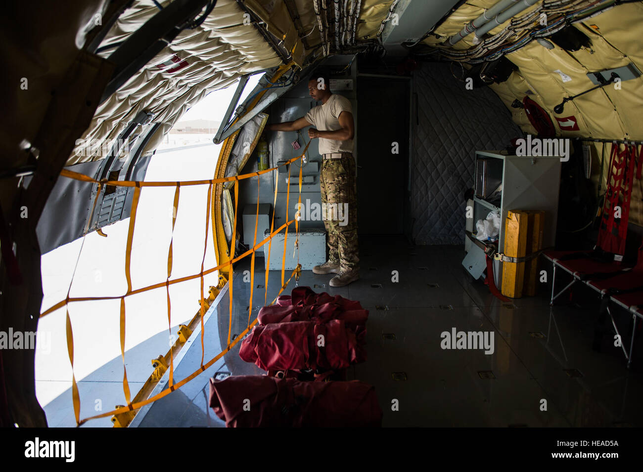 Senior Airman Charles Huggins, a KC-135 Stratotanker boom operator ...