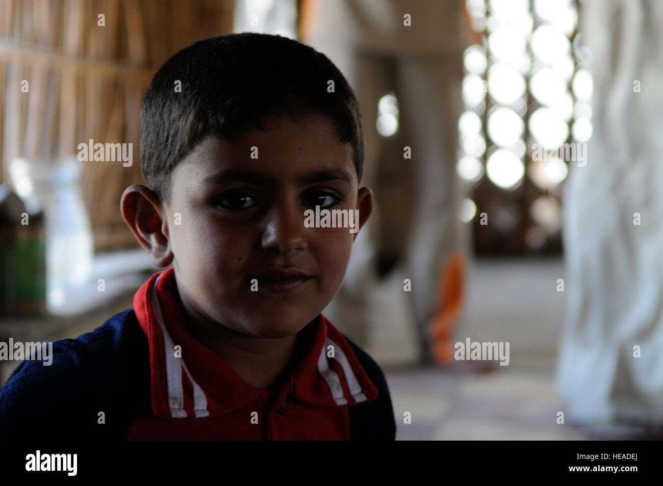 A young Iraqi boy poses for the camera during a key leadership ...
