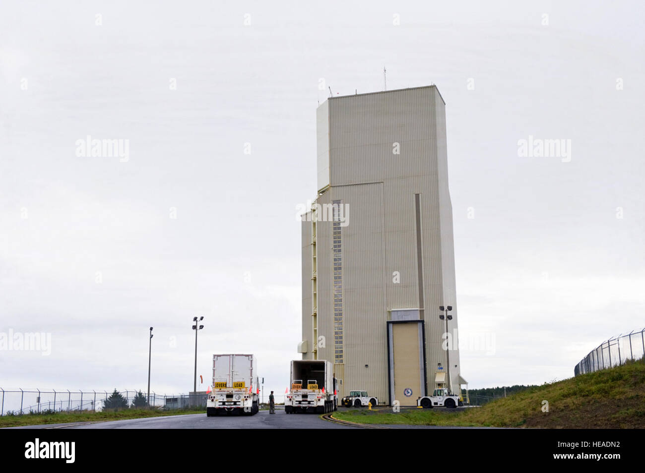 Two Type 2 transport vehicles, one loaded with a Minotaur IV stage and ...