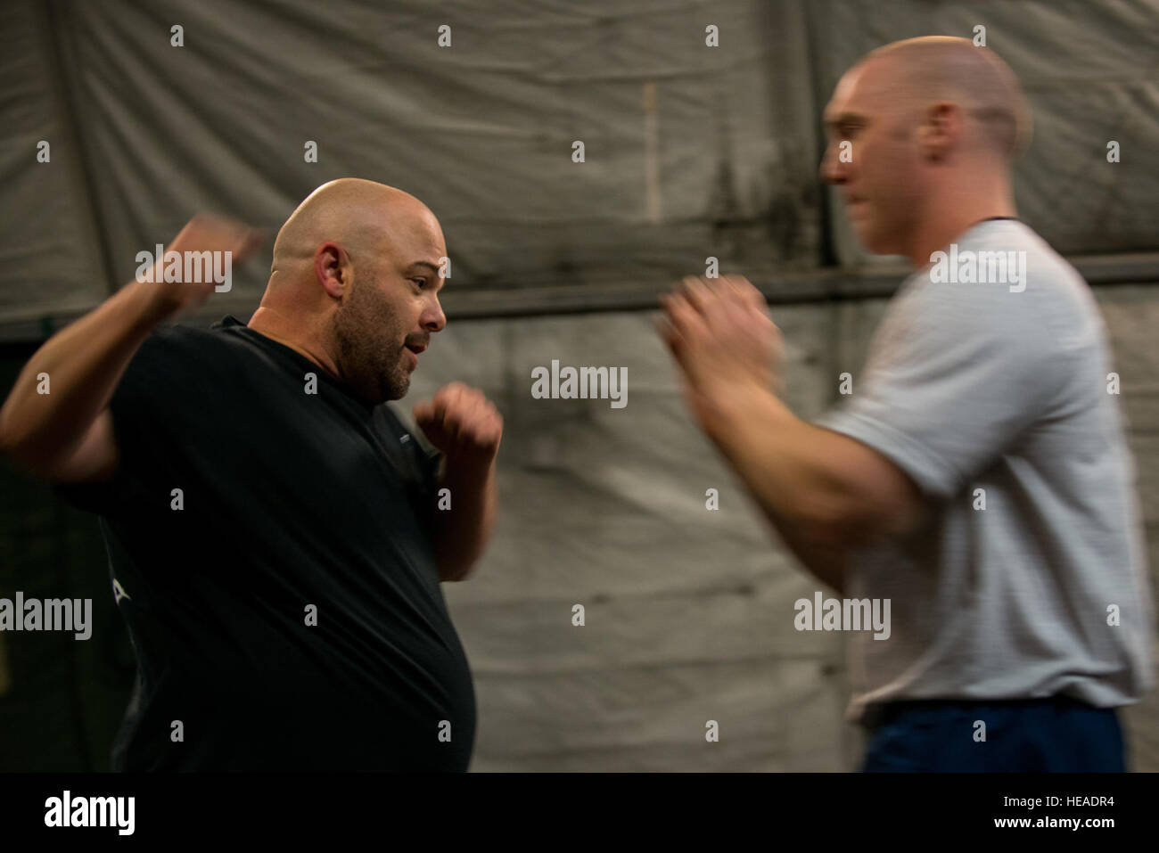 Jack Waid, 455th Air Expeditionary Wing historian, demonstrates a Krav ...