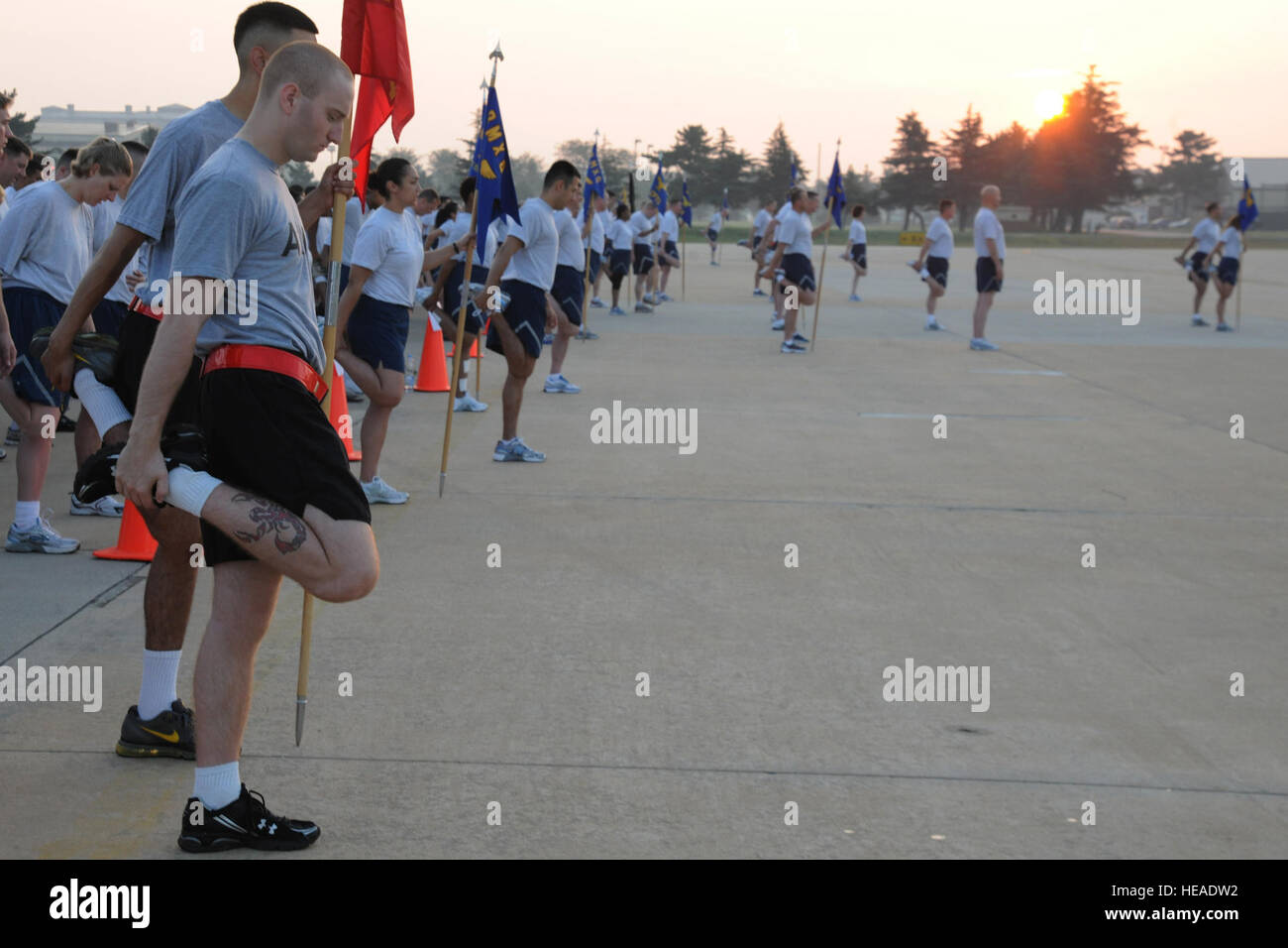 Members of the Wolf Pack conduct stretching exercises before a warrior ...