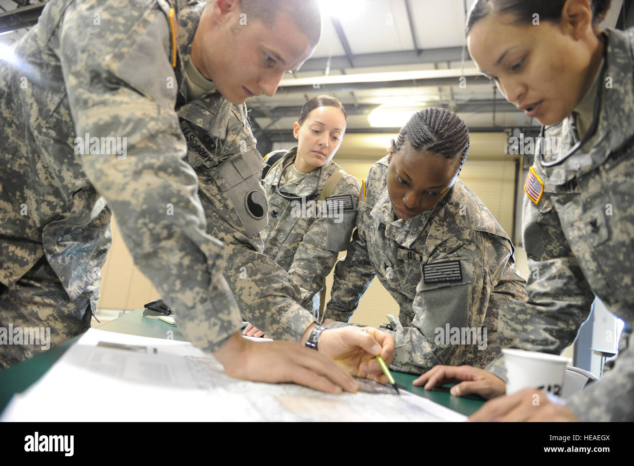 U.S. Army Specialist Charles Nicotera explains how to plot points on a ...