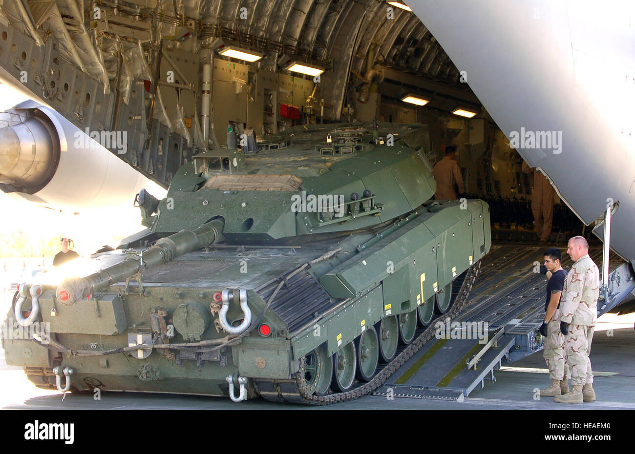 A Canadian Leopard tank is driven onto the C-17 Globemaster III named ...