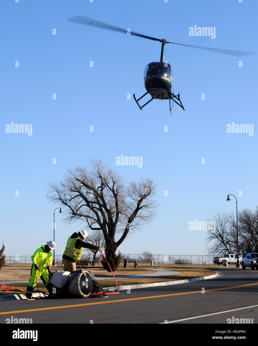 A helicopter takes off after unloading an airfield beacon from the base ...