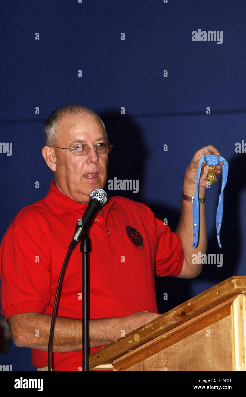 A retired U.S. Army Sergeant First Class displays his Medal of Honor ...