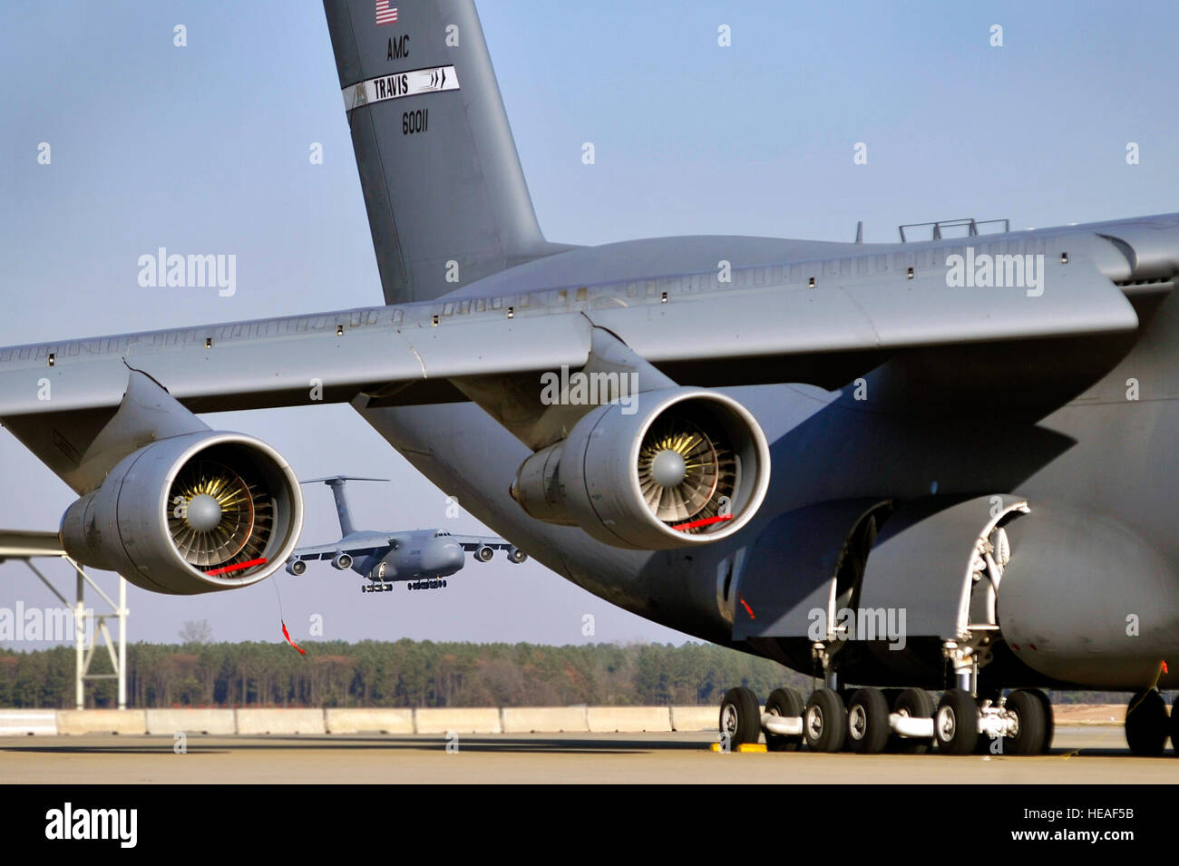 Three C-5 Galaxy aircraft make final approaches and land at Shaw Air ...