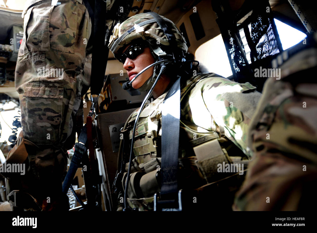 U.S. Air Force Staff Sgt. Angela Biggs, medic, communicates with other ...