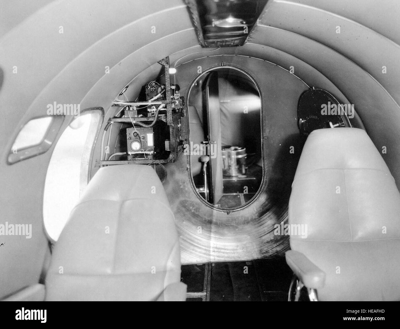 Lockheed XC-35 interior view, looking aft (pressure bulkhead hatch open ...