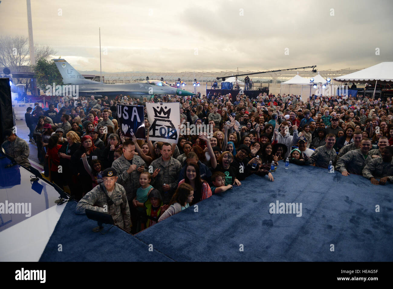 Airmen gather around the stage awaiting the arrival of Fall Out Boy and ...