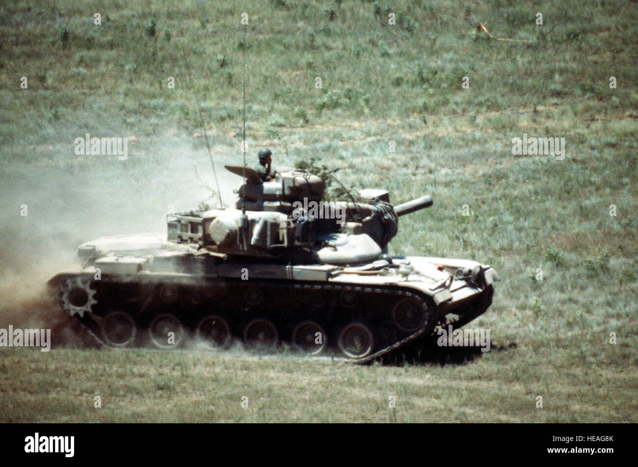 An M60A2 Main Battle Tank (MBT) maneuvers into position on the firing ...