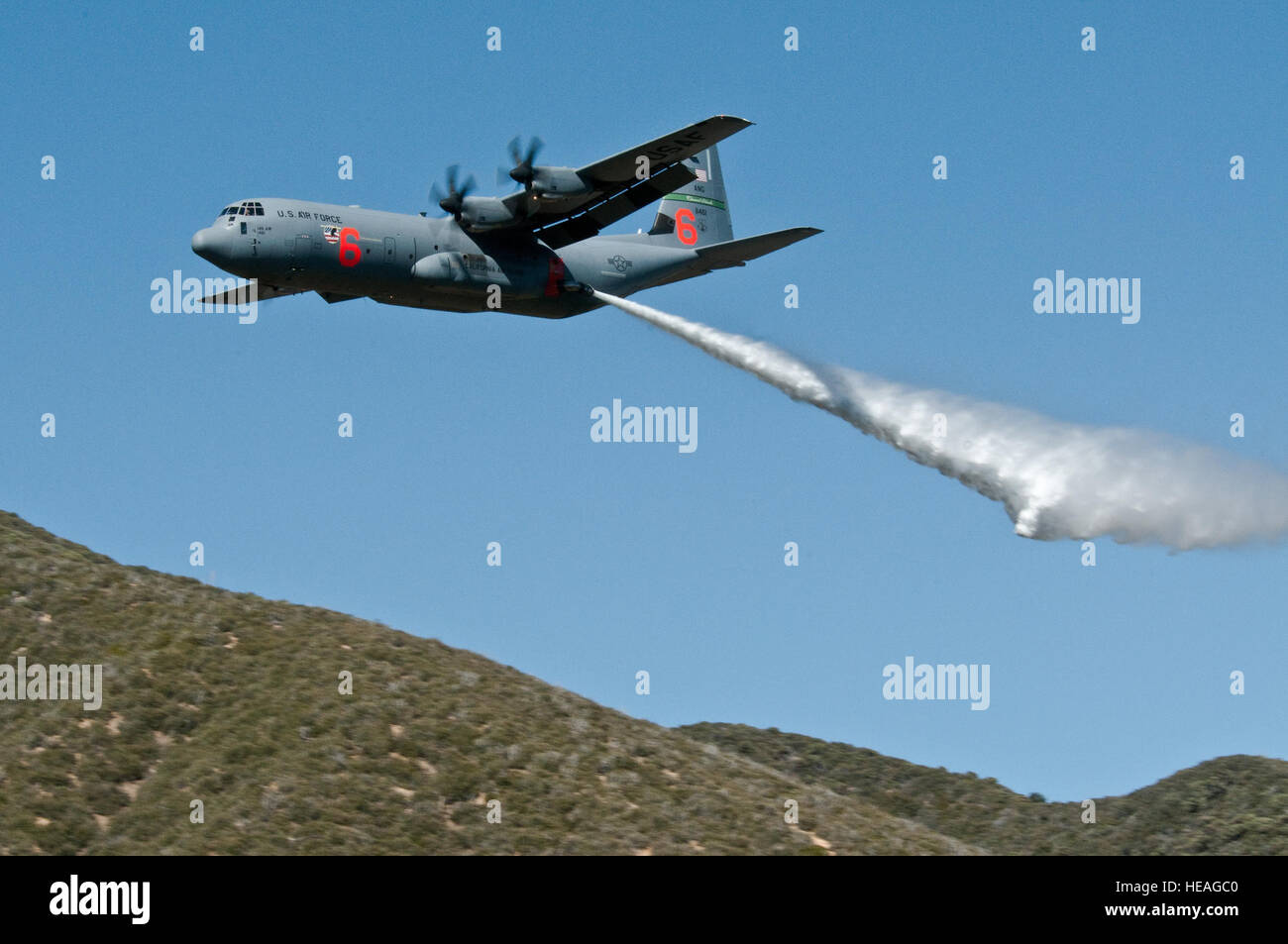 A C-130J Hercules aircraft equipped with Modular Airborne Firefighting ...