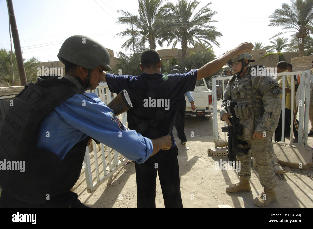 U.S. Army Pvt. Kelly Roark maintains security of potential Iraqi police ...