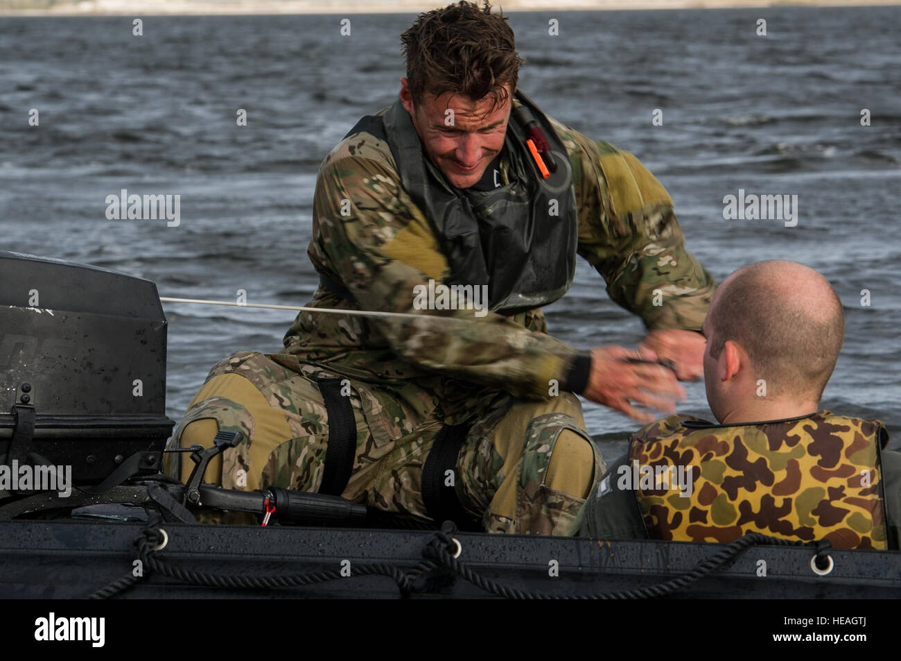 A U.S. Air Force airman from the 23rd Special Tactics Squadron pulls a ...