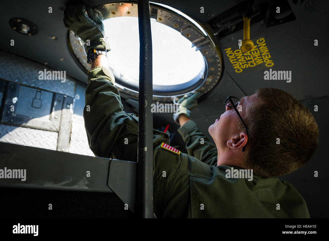 U.S. Air Force Senior Airman Adam Strom, a C-130 Hercules aircraft ...