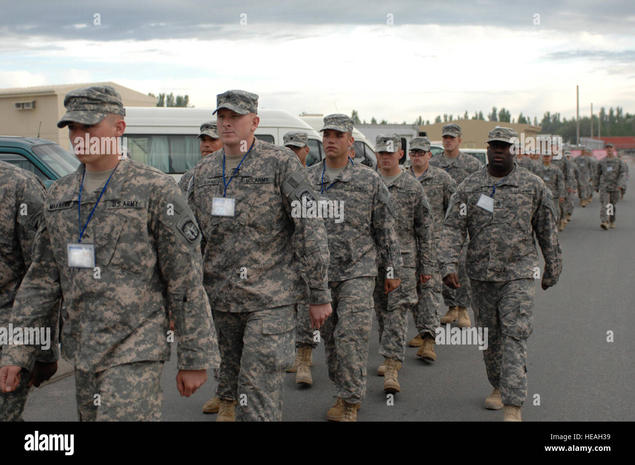 Staff Sgt. Willie Jones marches his squad back from the dining facility ...