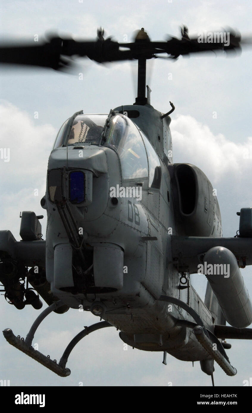A US Marine Corps (USMC) AH-1W Super Cobra from Helicopter Marine Light ...