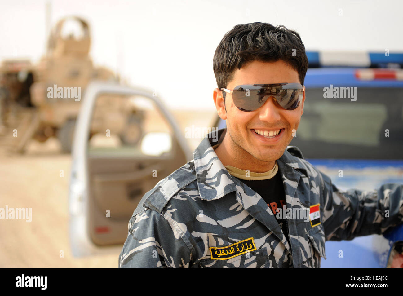 An Iraqi police officer from Al Anbar province, provides security for a ...