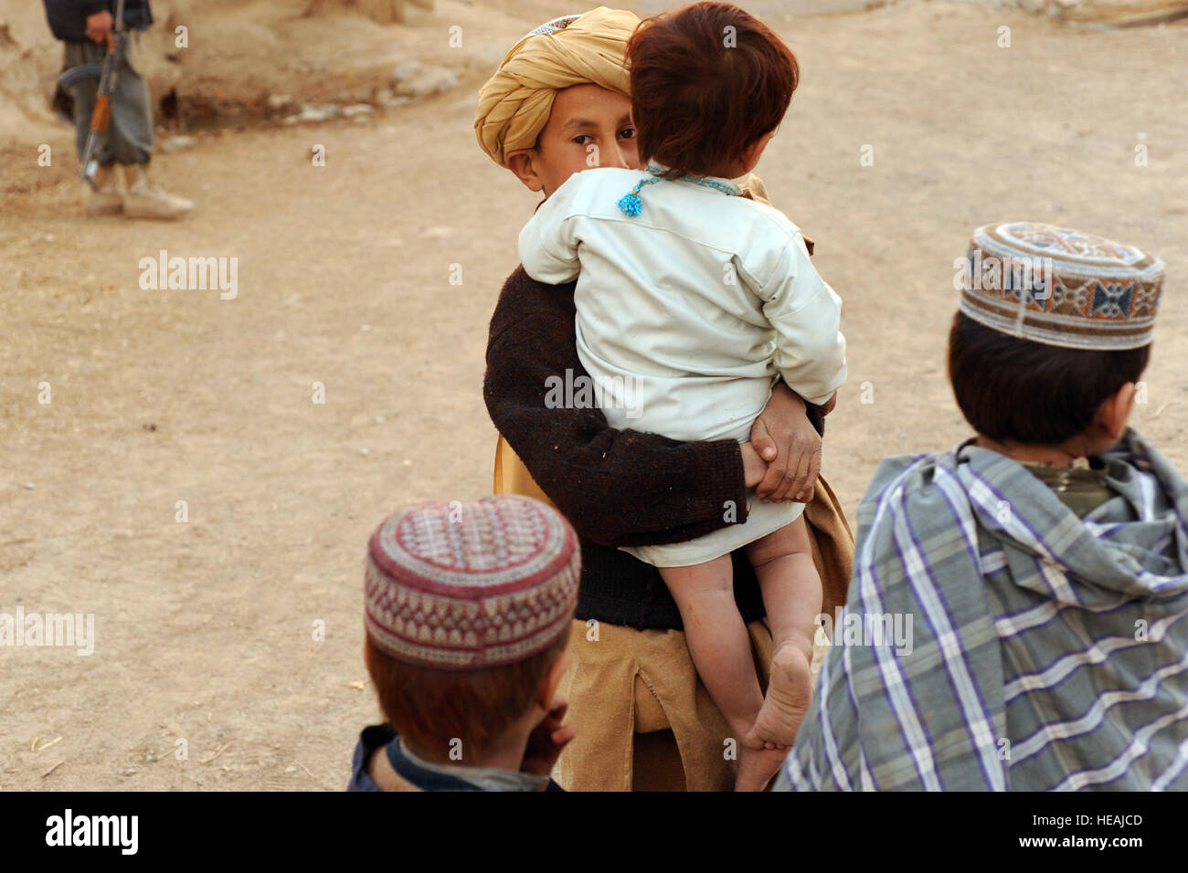 Afghan children observe a shura in the village of Shabila Kalan, Zabul ...