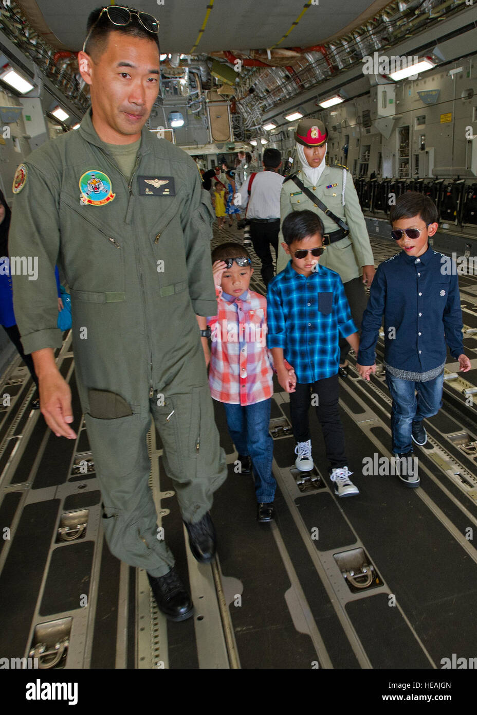 Children of the Brunei royal family tour a C-17 Globemaster III static ...