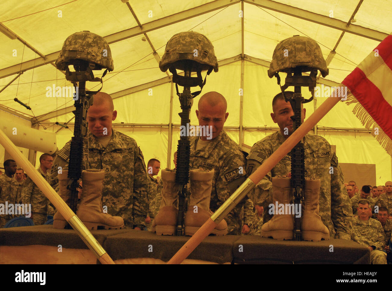 U.S. Soldiers from the 1st Battalion, 12th Infantry Regiment pay their ...