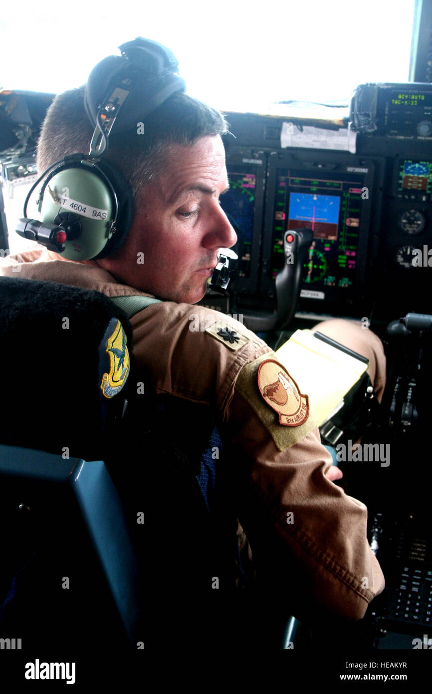 Lt. Col. Thomas Loper, C-5 pilot, pilots a C-5M Super Galaxy for a ...