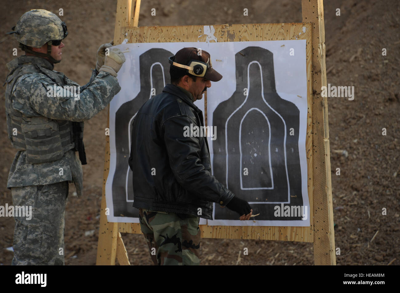 U.S. Army Sgt. Thomas Williams (left), 302nd Military Police Company ...