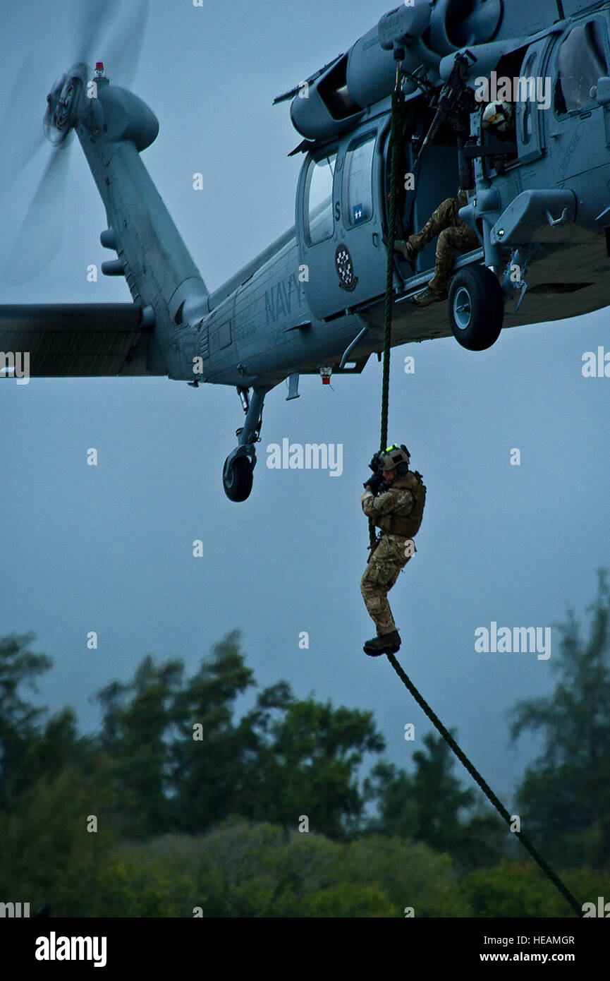 A U.S. Navy sailor assigned to Explosive Ordnance Disposal Mobil Unit ...