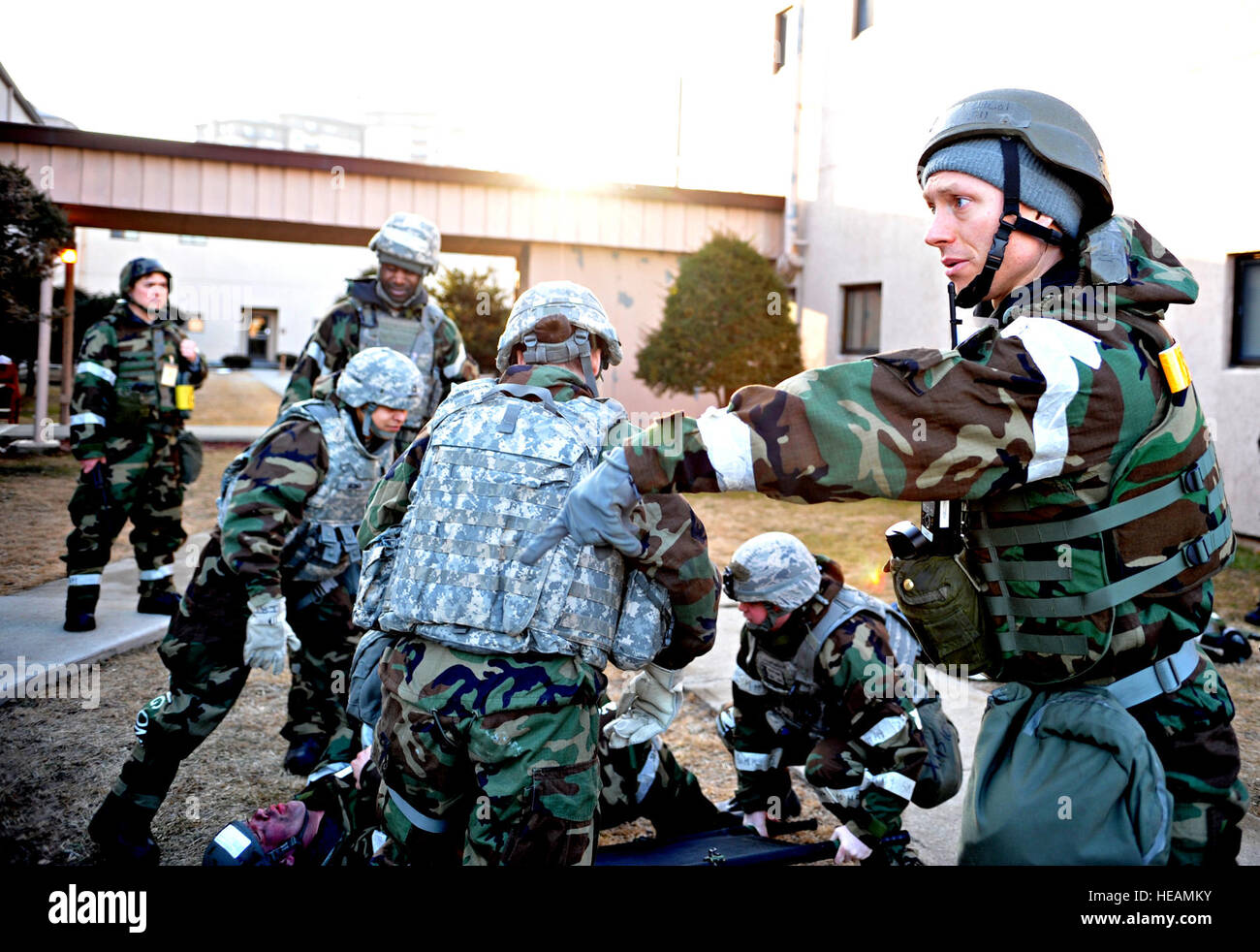 A member of the 51st Medical Group Field Response Team directs the ...