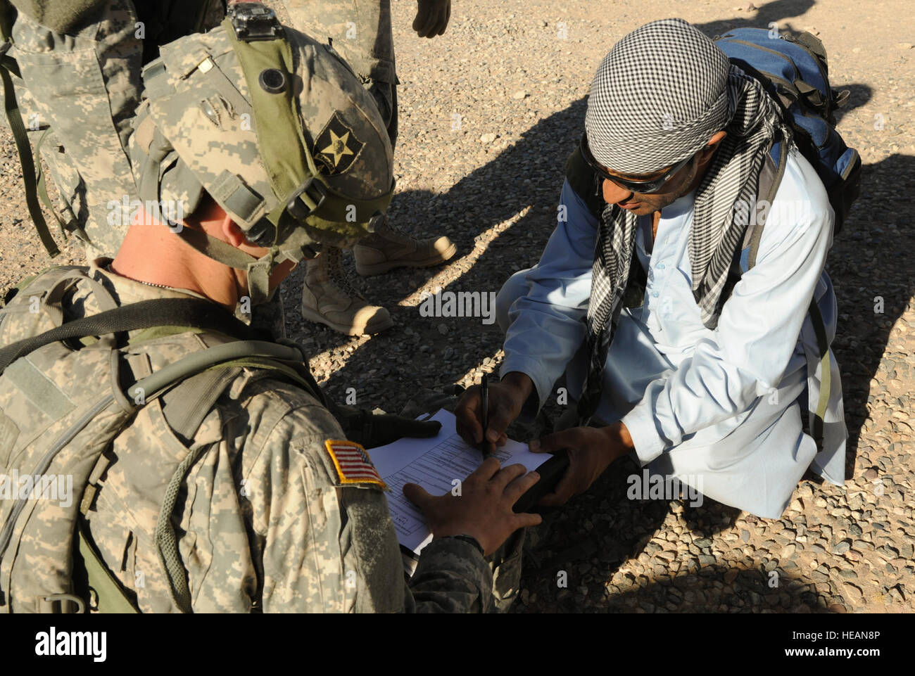 U.S. Army 2LT. Richard Hawks, 4th Brigade, 9th Infantry Division, left ...