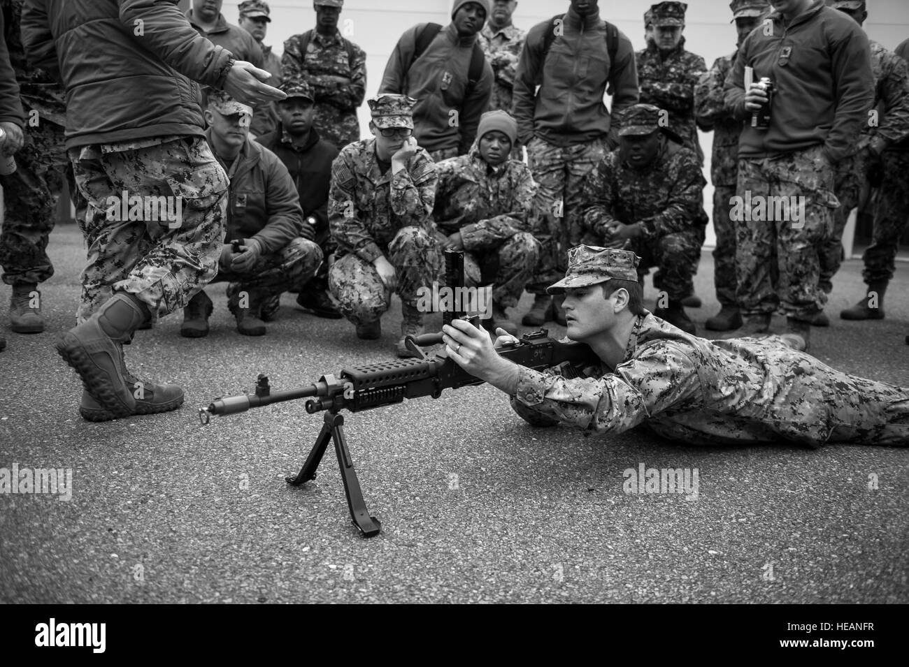 Master at Arms 1st Class Chase Ferguson shows basic weapon handling ...