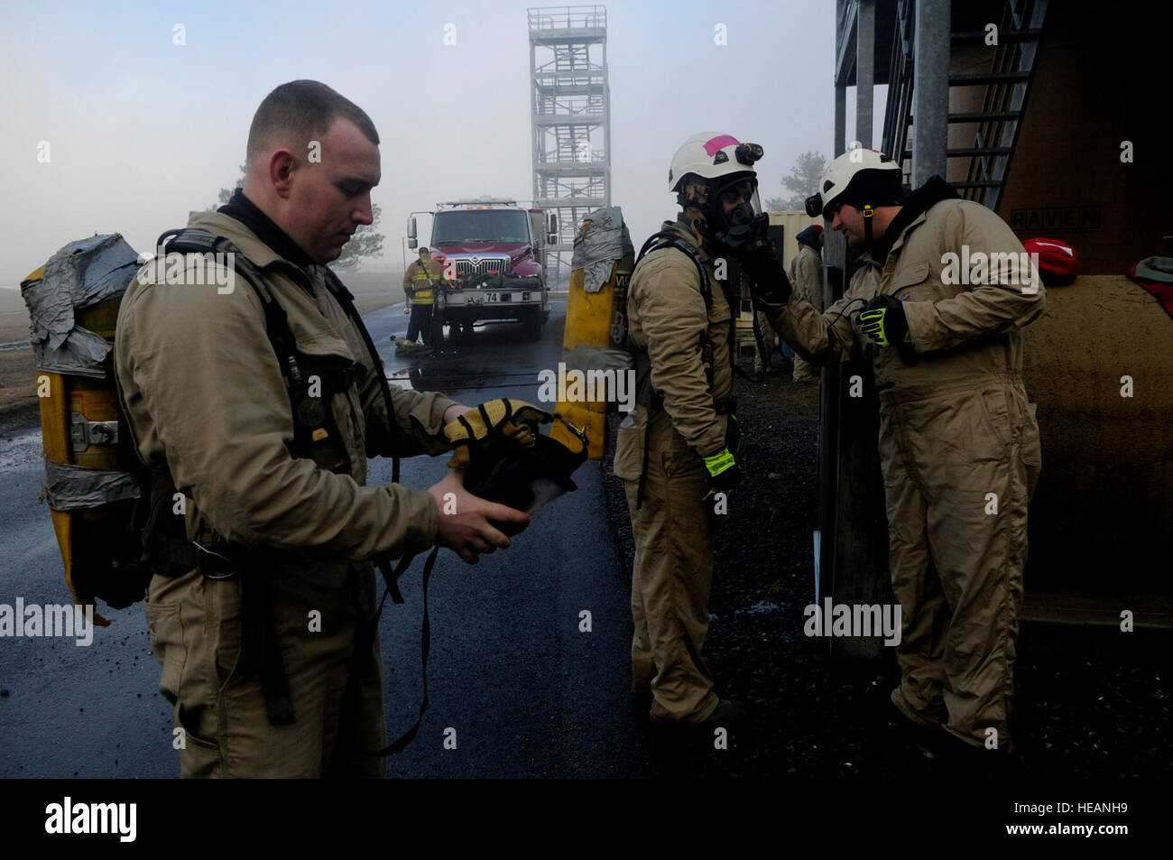 Staff Sgt. Jeremy Lundgren prepares to apply his mask in preparation ...