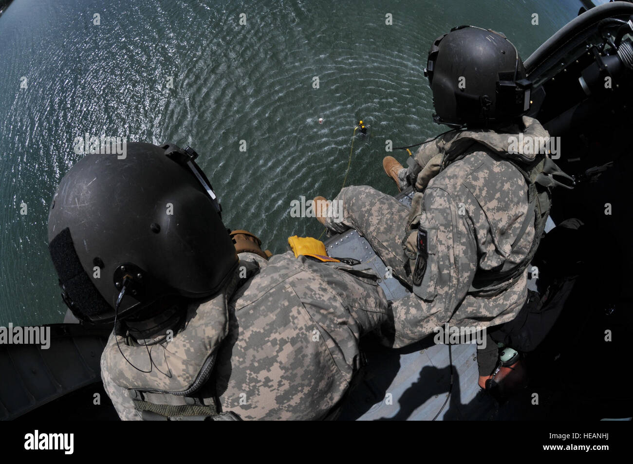 Sgt. 1st Class Robin McDaniel (left) and Sgt. Charles sit ready in a ...
