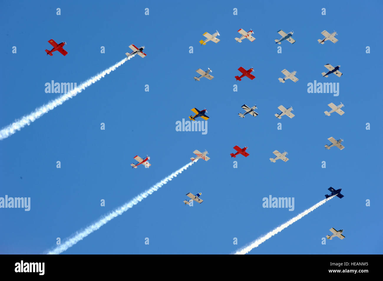 Aircraft flight together in the Trainer Aircraft Parade during the 2010 ...