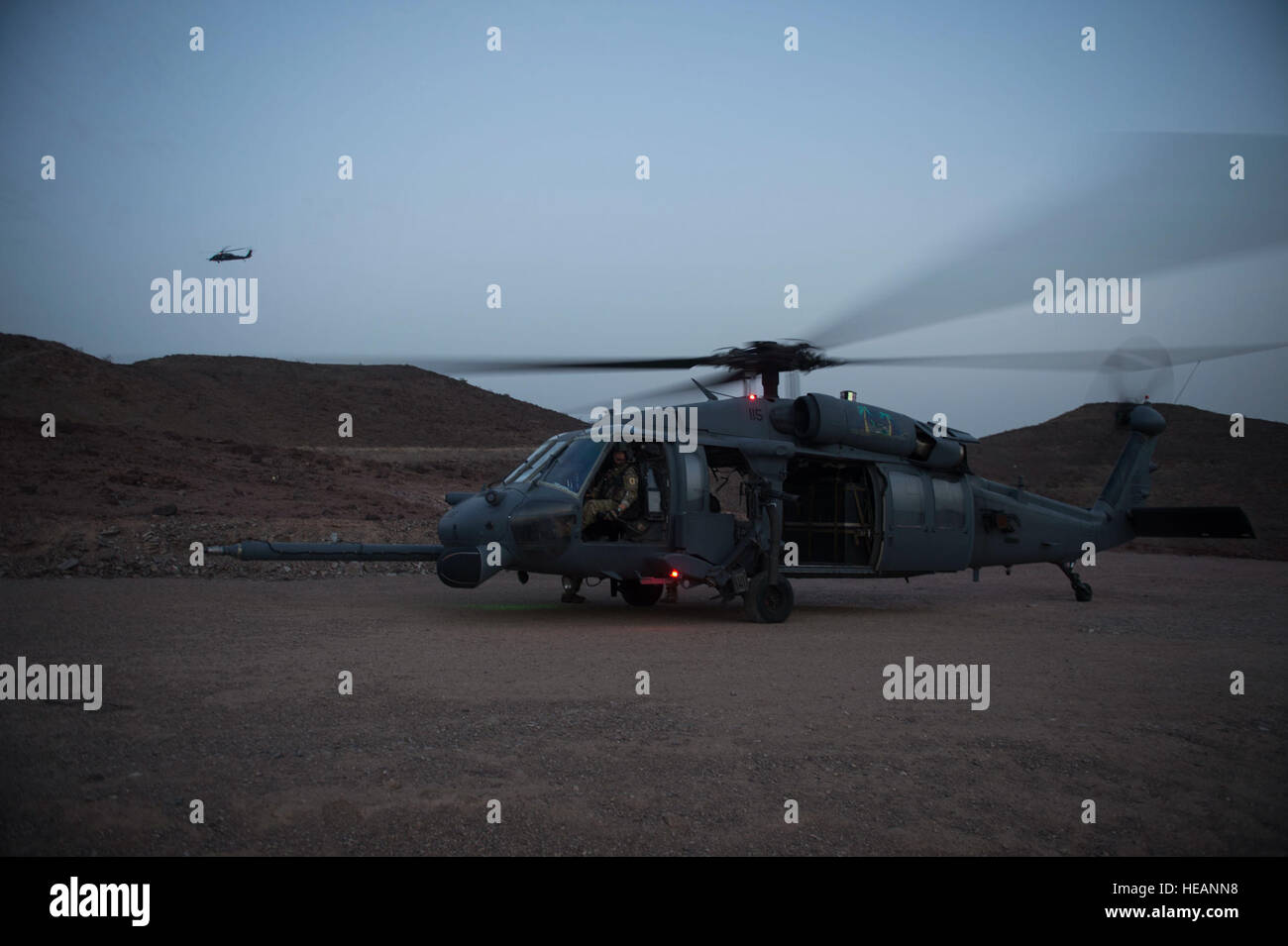 A UH-60 flown by the 303rd Expeditionary Rescue Squadron waits for take ...