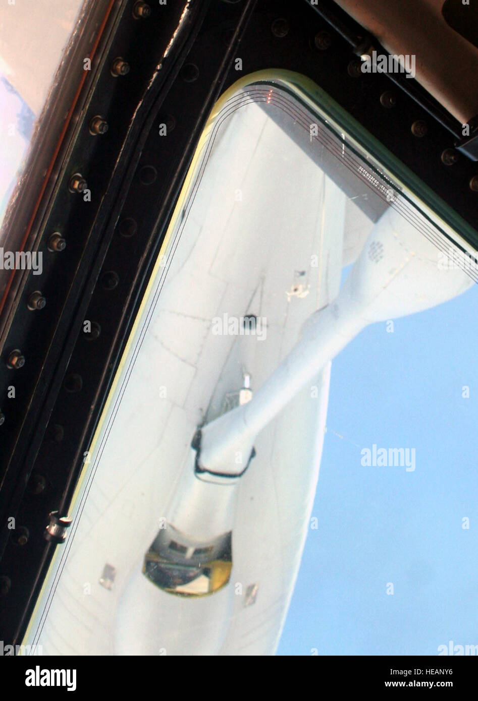 A KC-135R Stratotanker from the 157th Air Refueling Wing refuels a C-5M ...