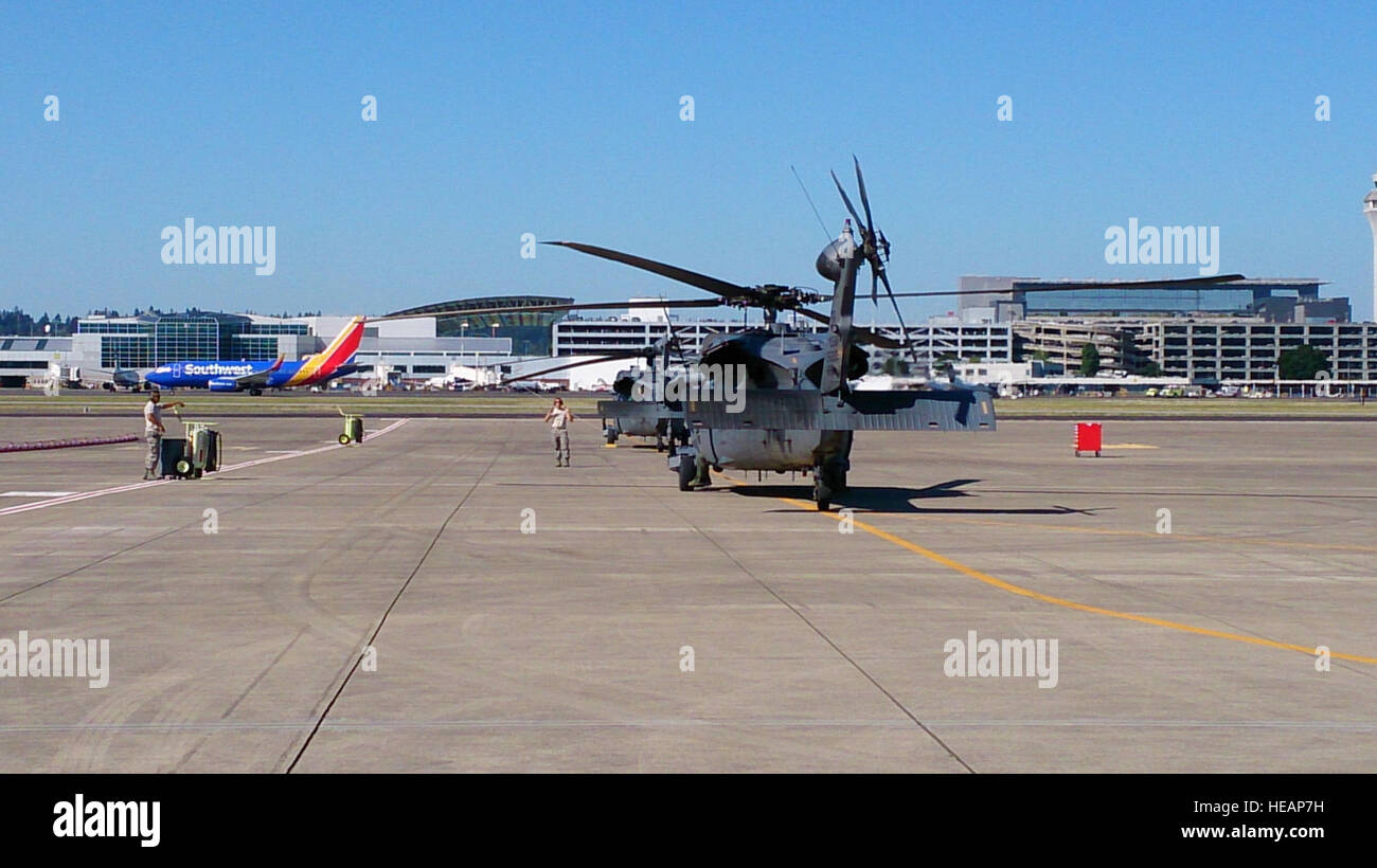 A 305th Rescue Squadron HH-60 and 79th Rescue Squadron HC-130J are ...