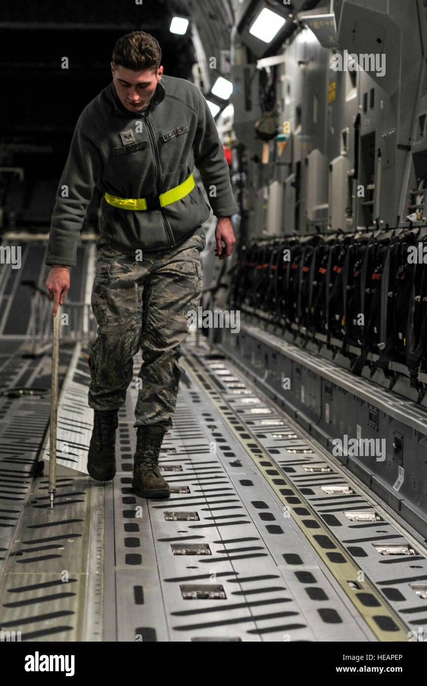 Senior Airman Anthony Landry, a crew chief with the 437th Aircraft ...