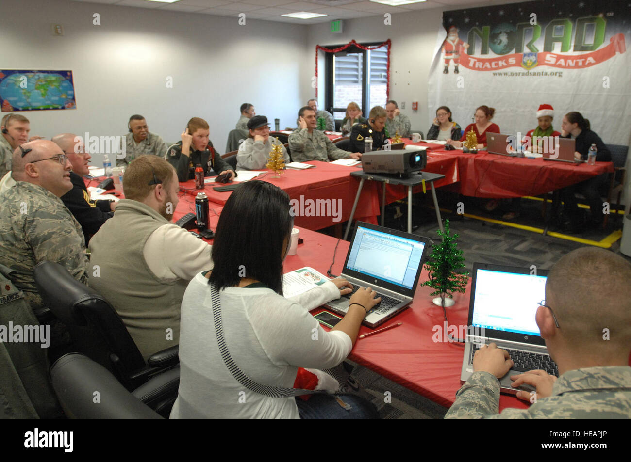 Volunteers monitor phones and computers while tracking Santa Claus at ...