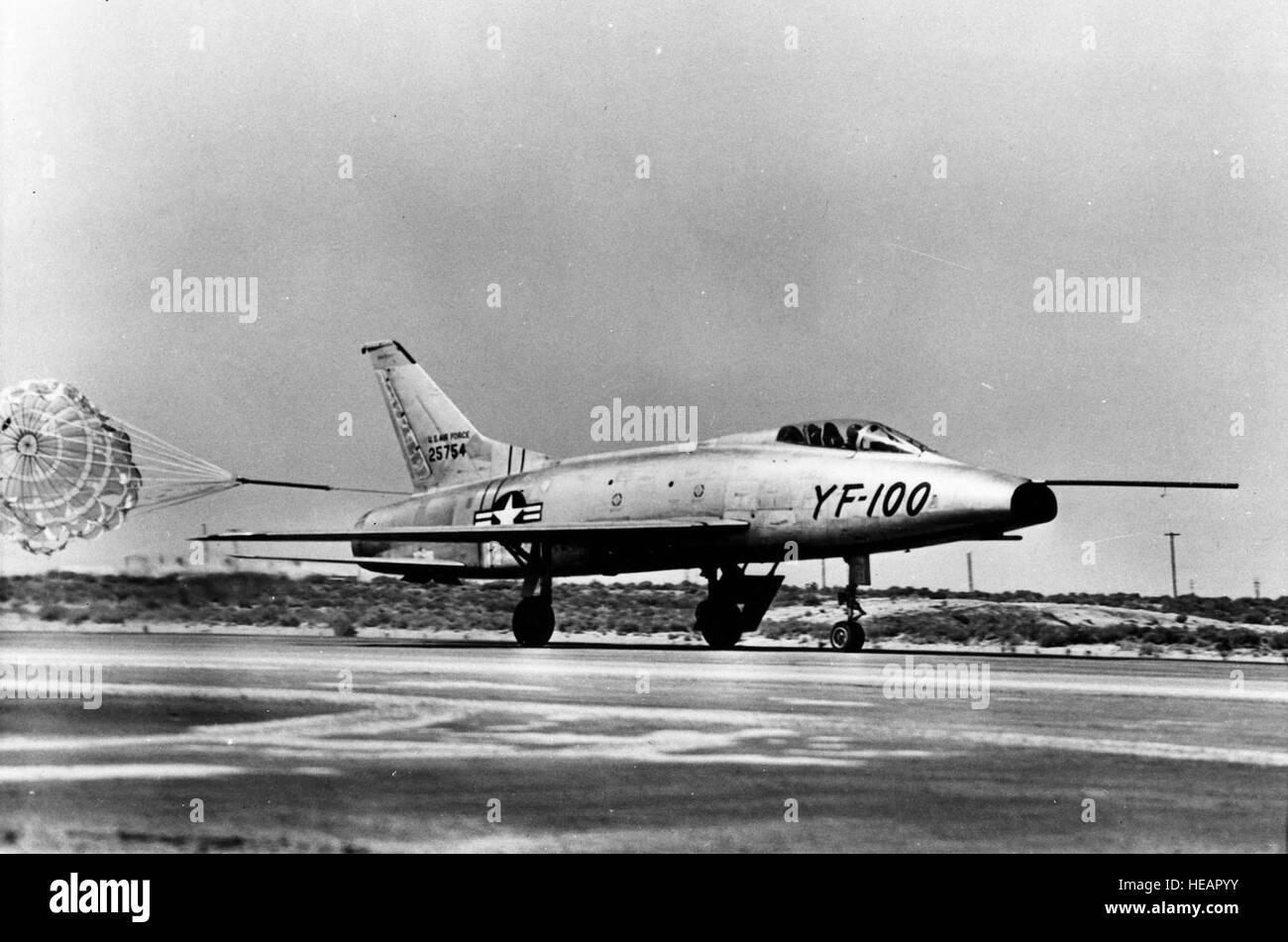 The first North American YF-100 built (S/N 52-5754) landing with drag chute. (U.S. Air Force ...