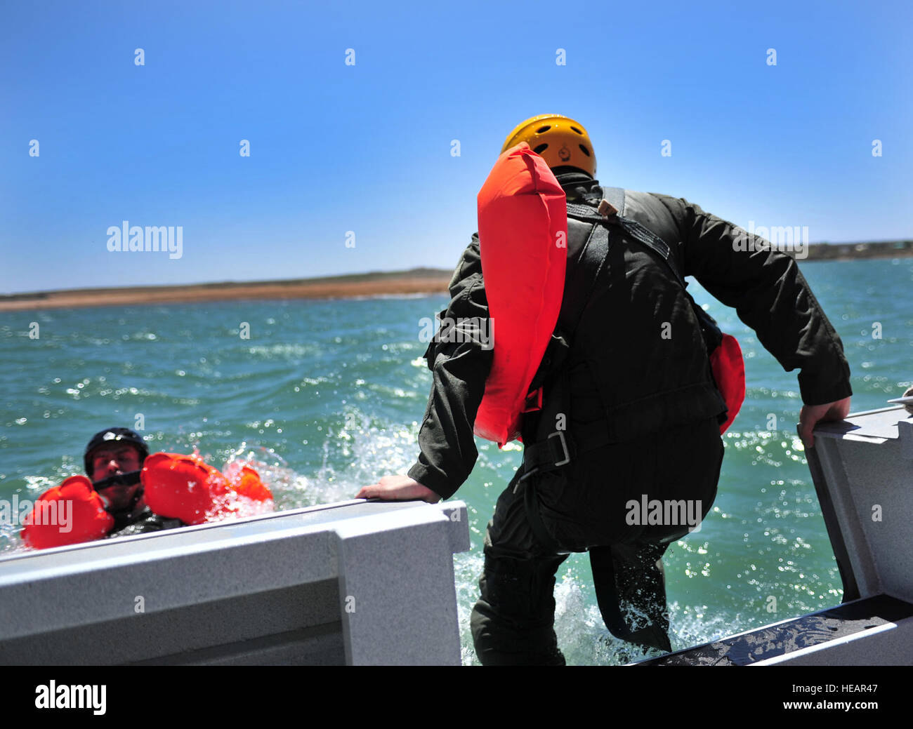U.S. Air Force aircrew members are told to jump off a boat for the next ...