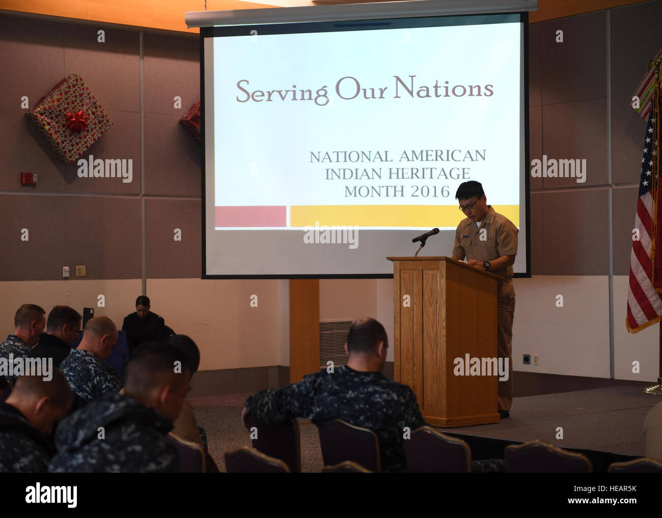 At Naval Station Everett, the command chaplain leads a prayer during ...
