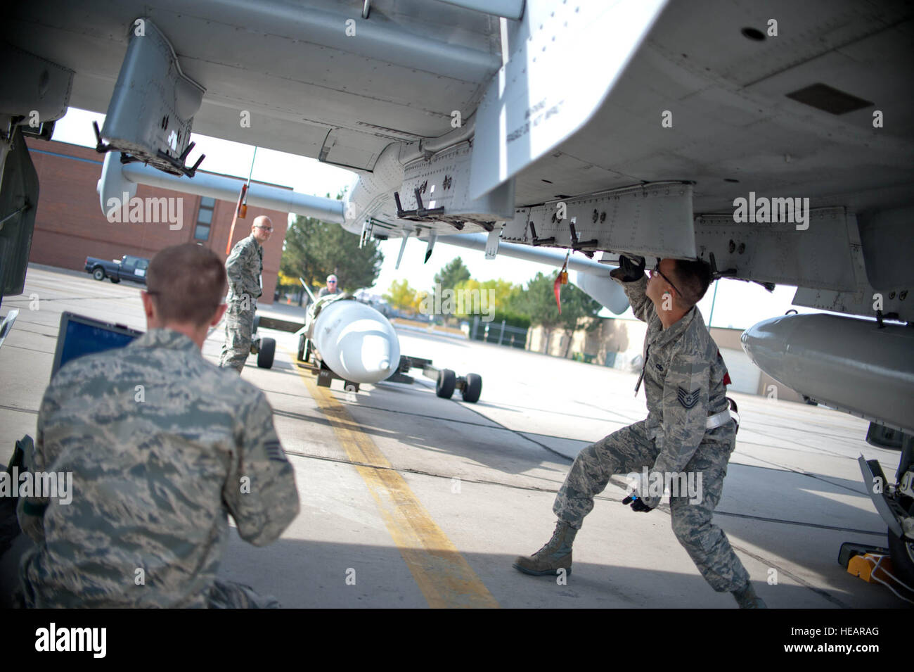 The 124th Aircraft Maintenance Squadron crew chiefs install a ...