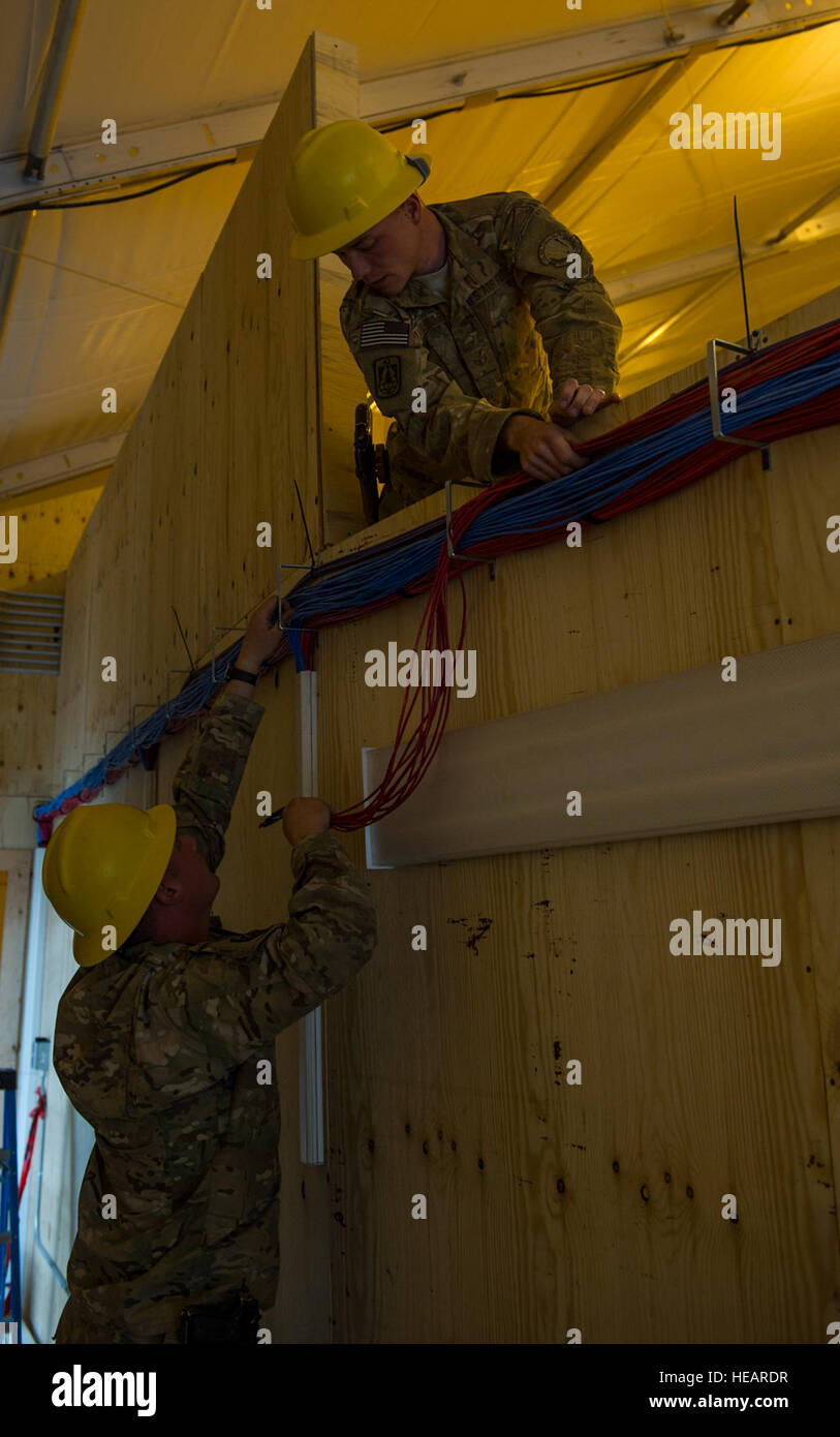U.S. Air Force Staff Sgt. Kevin Rochat, left, 160th Theater Signal ...