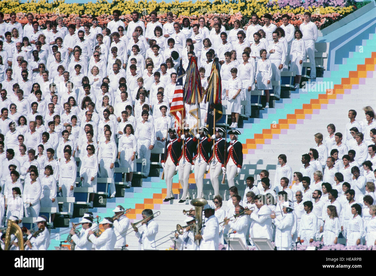 A color guard wearing Revolutionary War costumes participates in the ...