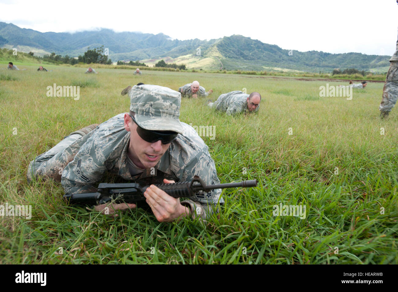 U.S. Army Capt. Daniel Weidman and Marine Sgt. Kevin Sprouse hurry ...