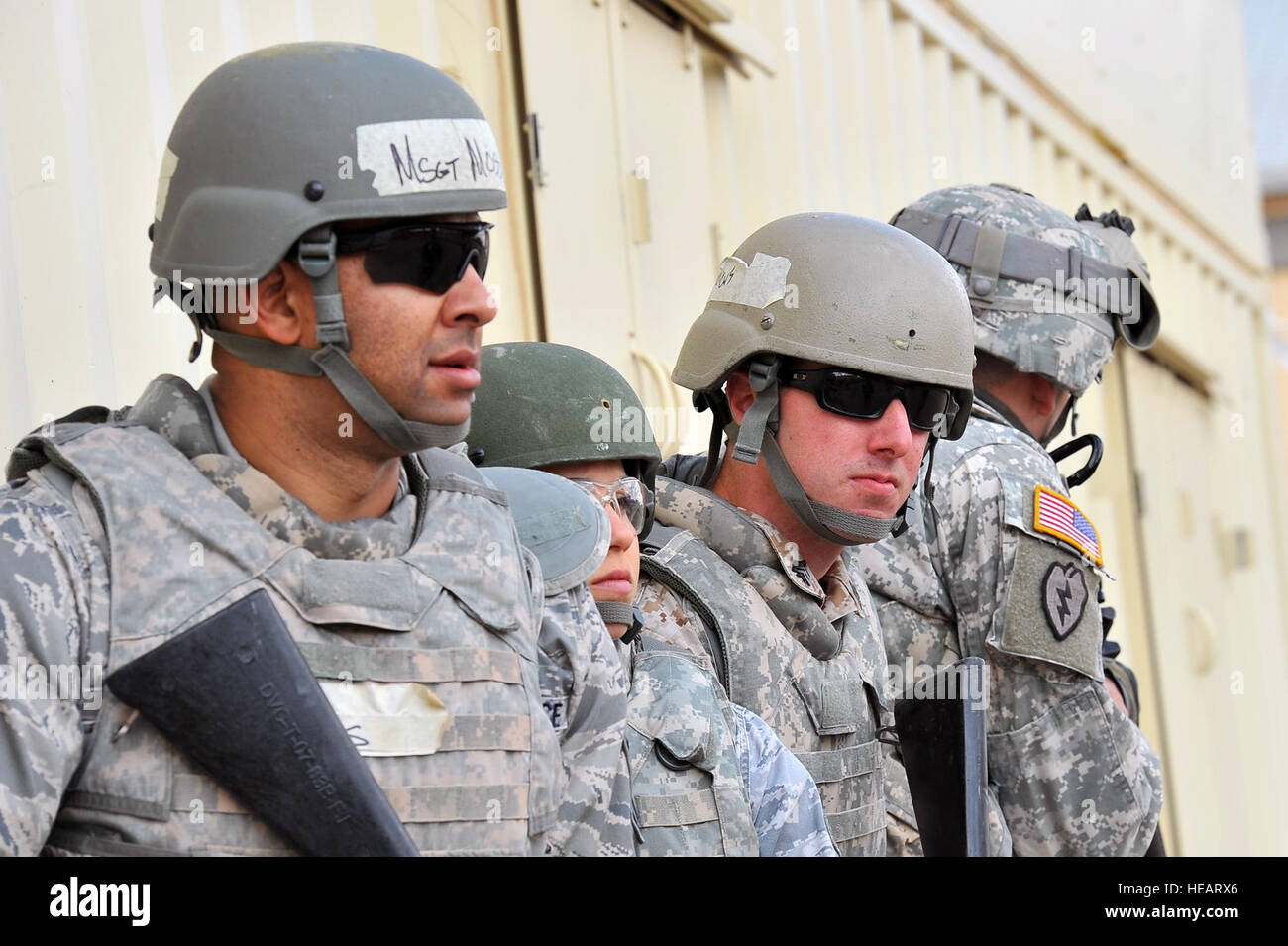 U.S. Air Force Master Sgt. Eric Moss prepares to kick in a door during ...