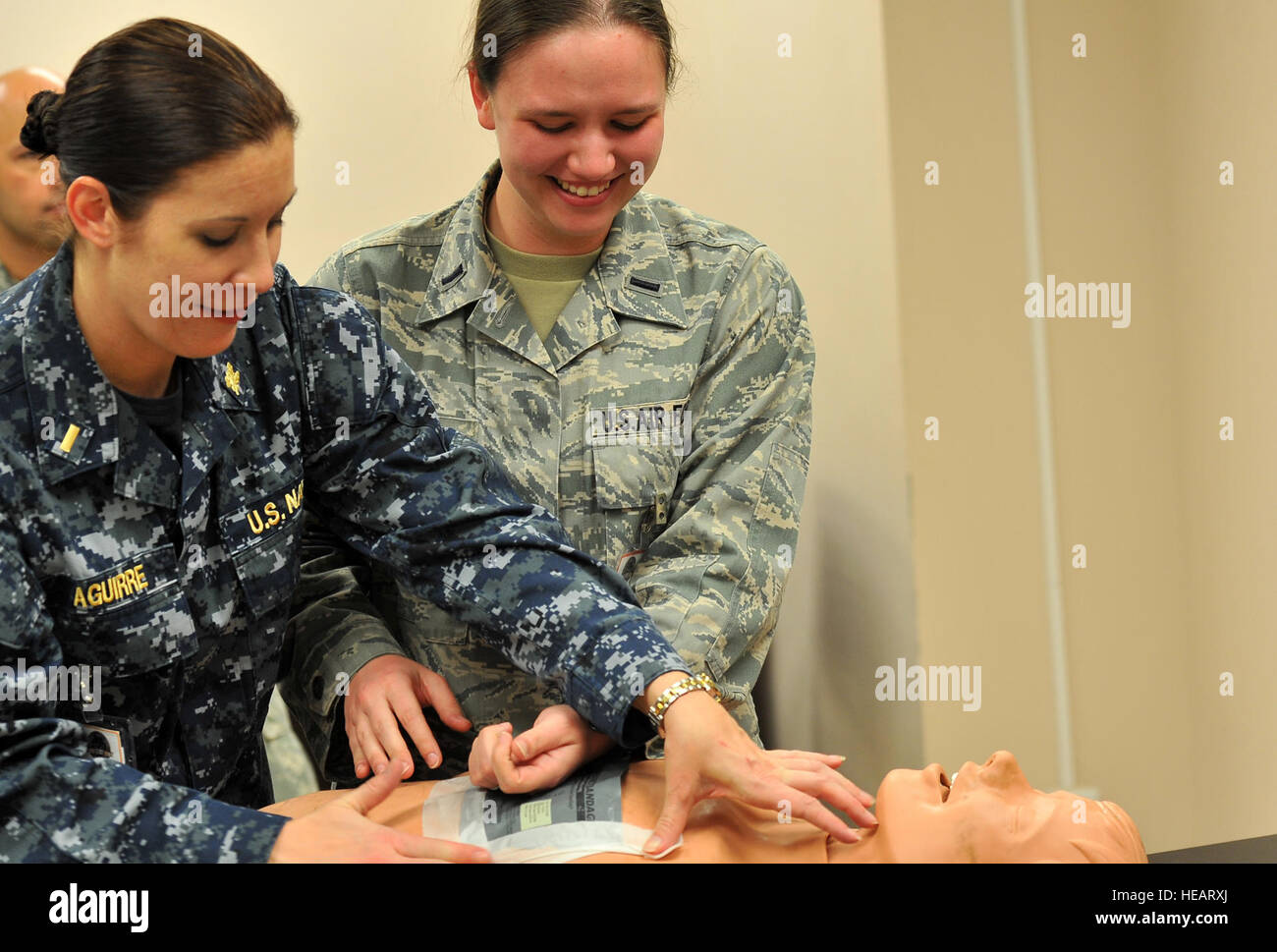 U.S. Navy Ensign Amy Aguirre and U.S. Air Force 1st Lt. Amy Bragg patch ...